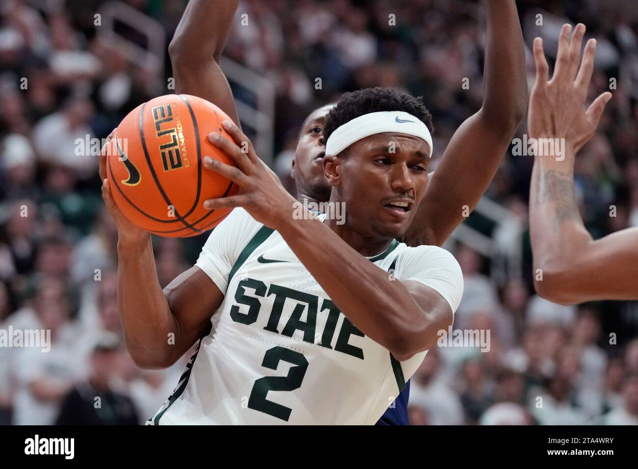 Michigan State guard Tyson Walker looks to pass during the second half ...