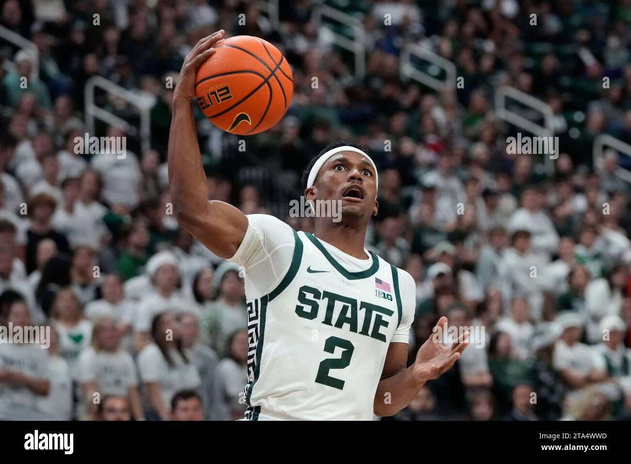 Michigan State guard Tyson Walker attempts a layup during the second half of an NCAA college ...