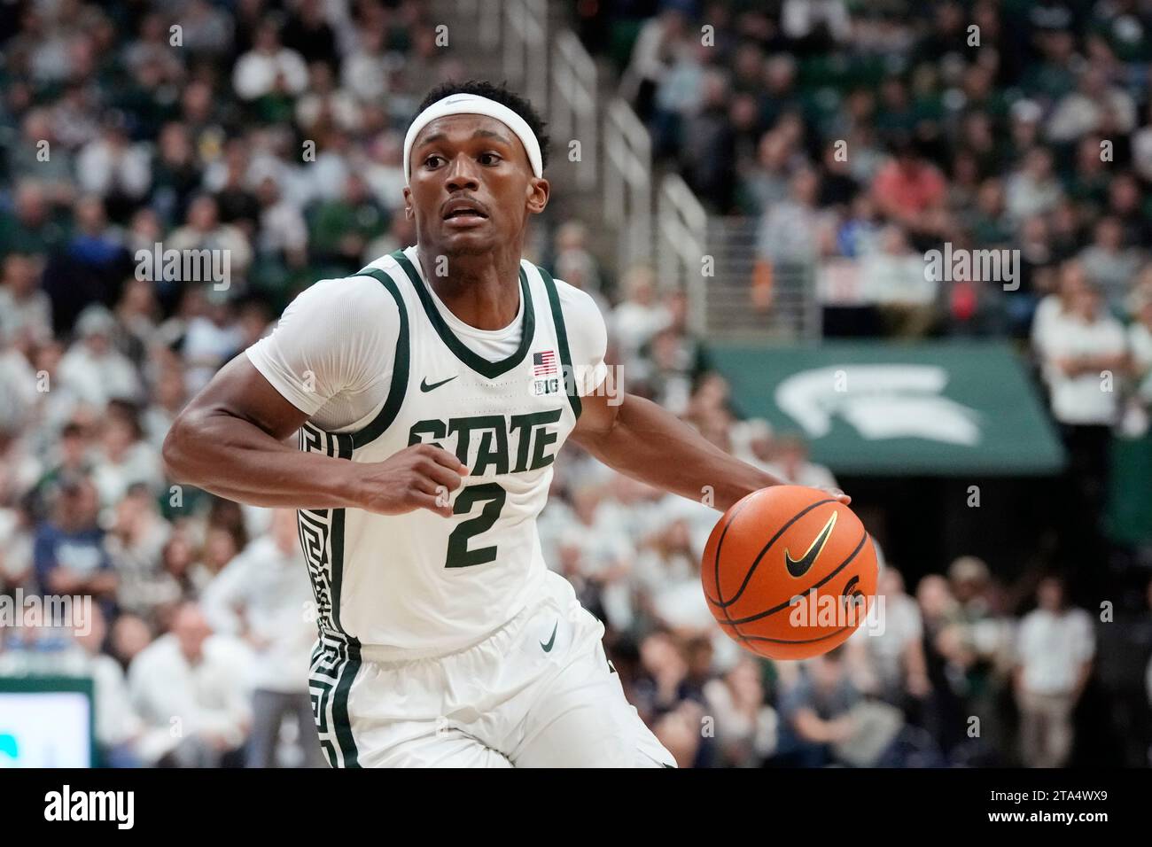 Michigan State guard Tyson Walker brings the ball up court during the ...
