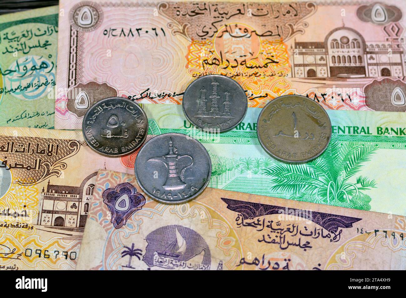 United Arab of Emirates money background of old coins and banknotes of ...