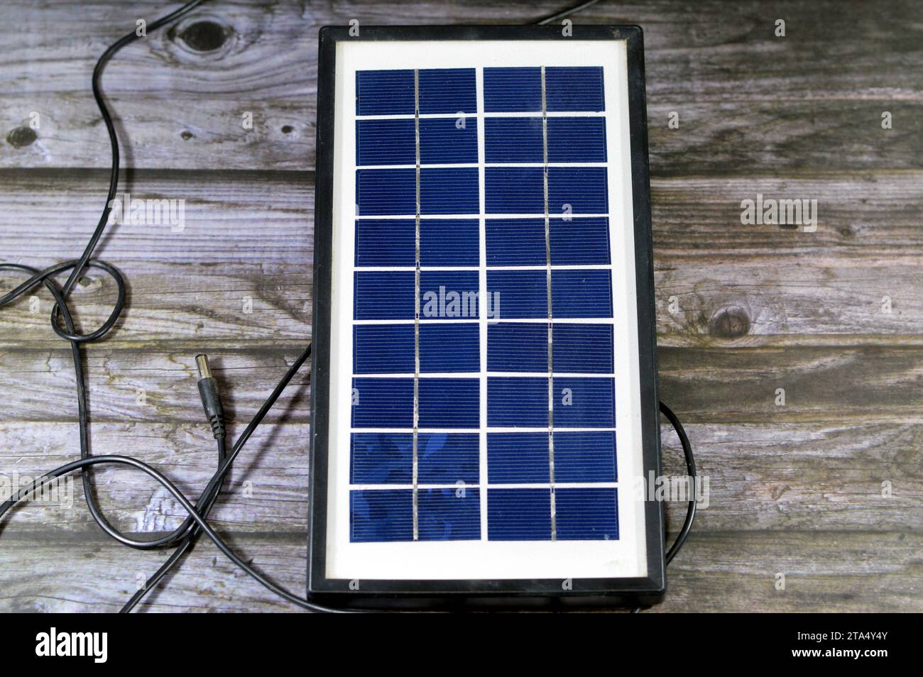 A solar panel, a device that converts sunlight into electricity by ...