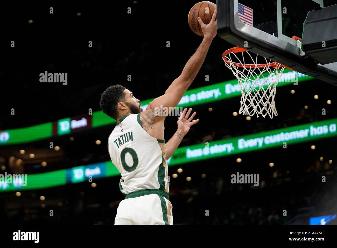 Boston Celtics forward Jayson Tatum (0) drives to the basket in the ...