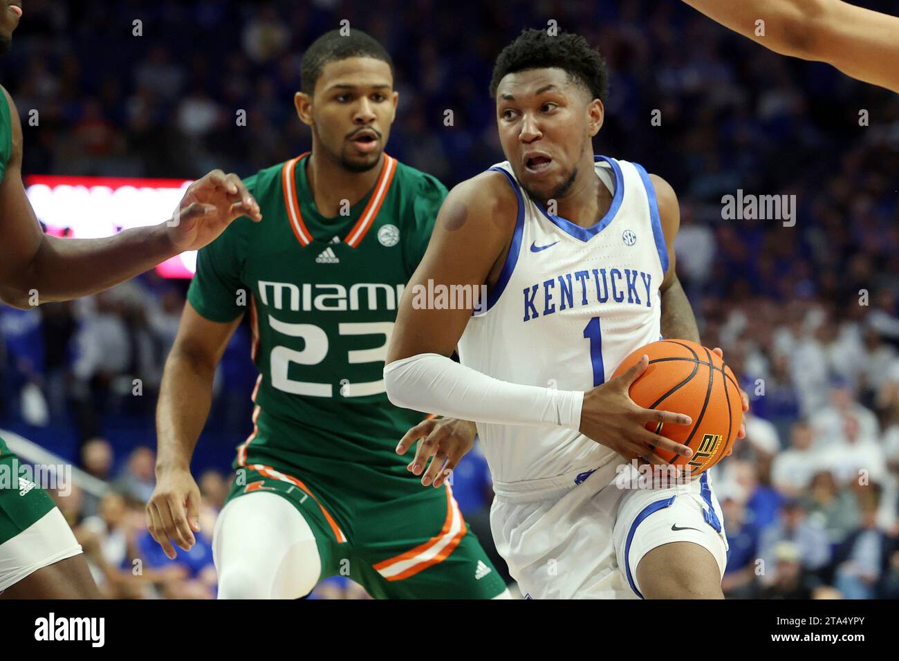 Kentucky's Justin Edwards (1) drives near Miami's AJ Casey (23) during ...