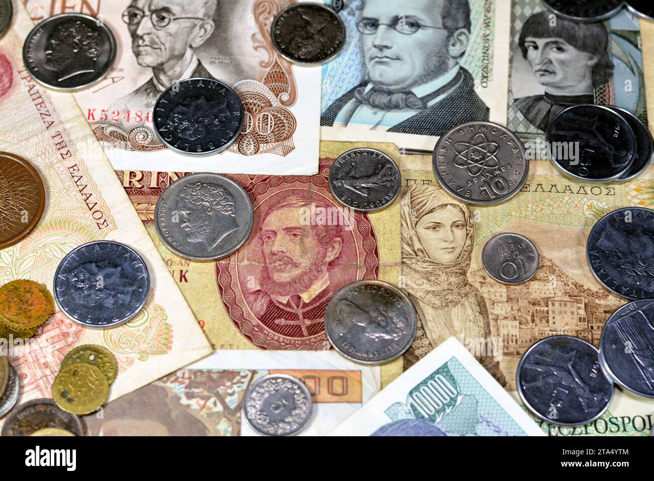 Old money currency of banknotes and coins from different countries of ...