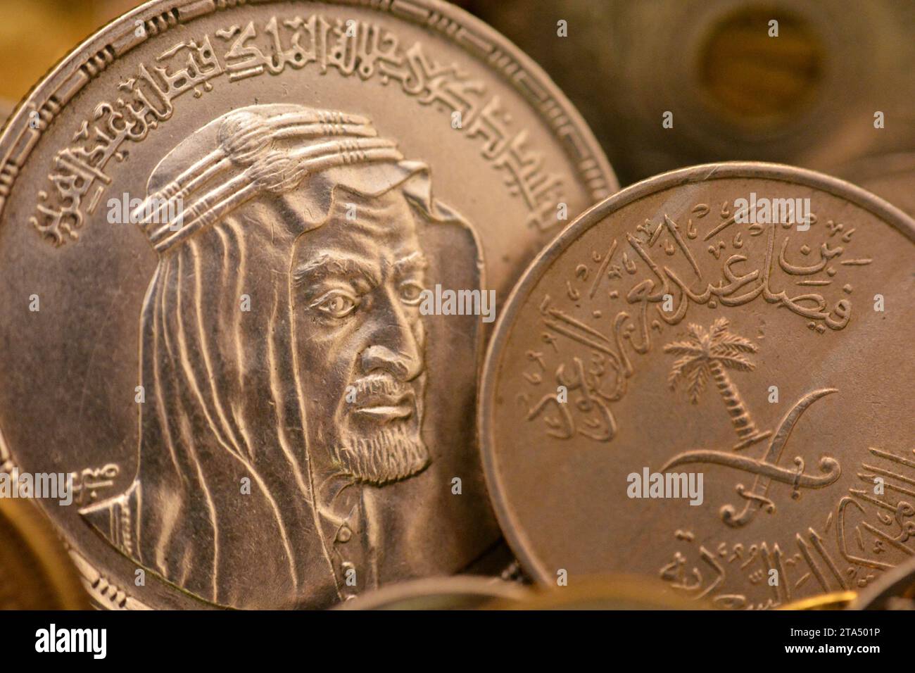 An old vintage retro Saudi Arabia coin at the Era of king Faisal, An ...