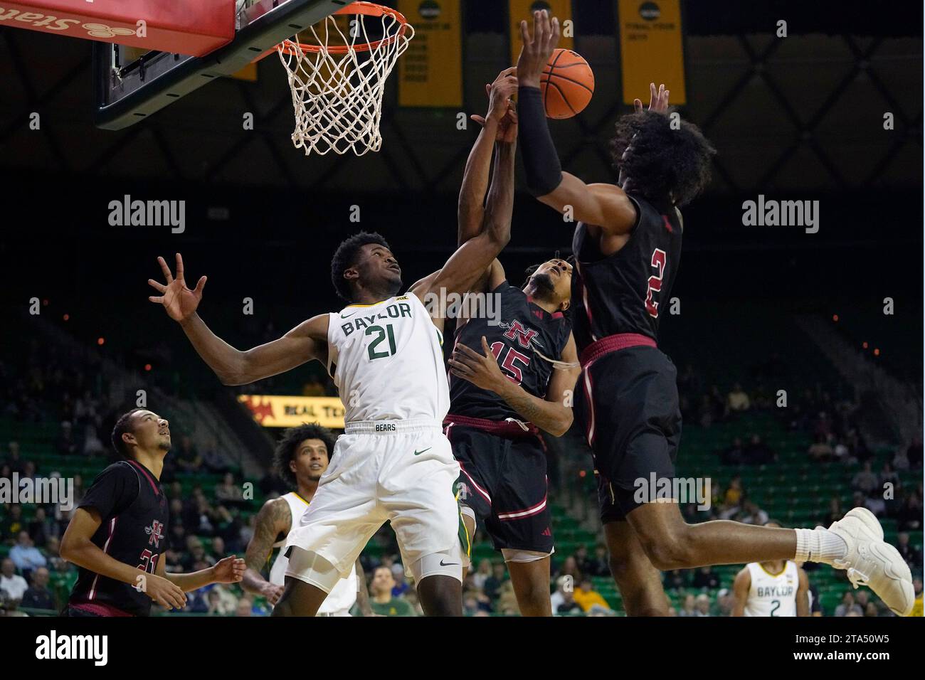 Baylor center Yves Missi (21) jumps for the rebound against Nicholls ...
