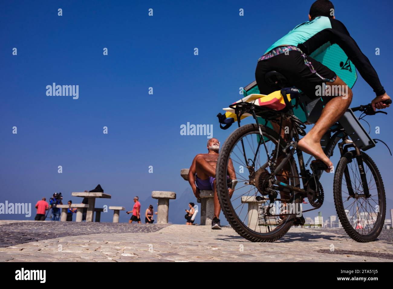 Retired elederly man enjoys a sunny morning at Arpoador beach - young ...