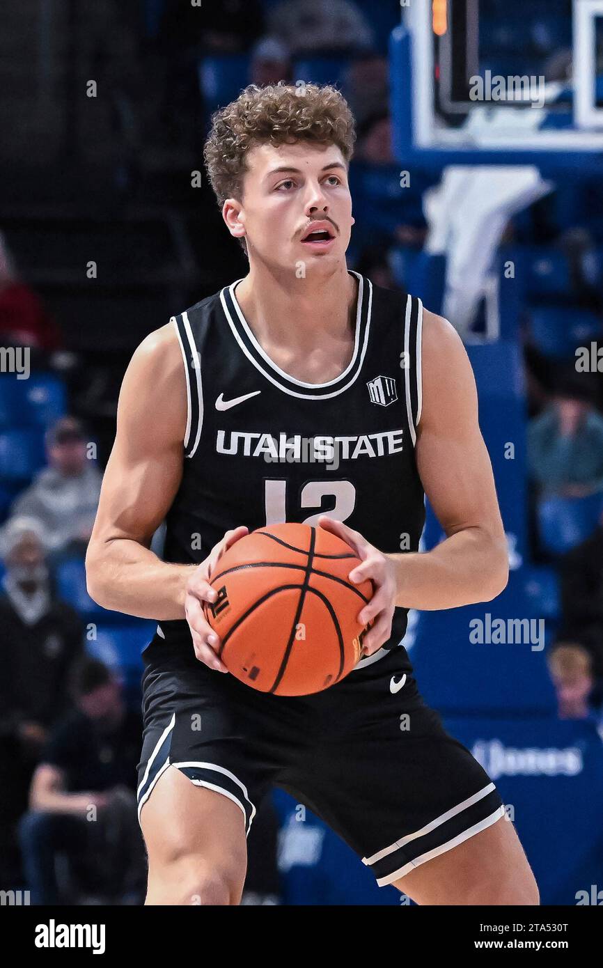 NOVEMBER 28, 2023: Utah State Aggies guard Mason Falslev (12) in a ...