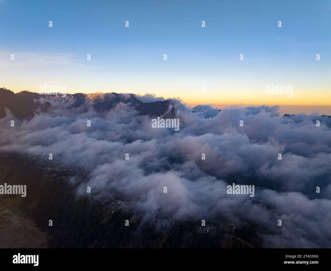 Aerial view of flowing fog waves on mountain tropical rainforest,Bird ...