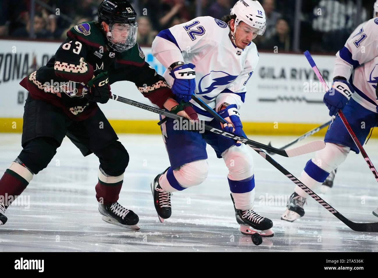 Tampa Bay Lightning center Alex Barre-Boulet (12) battles with Arizona ...