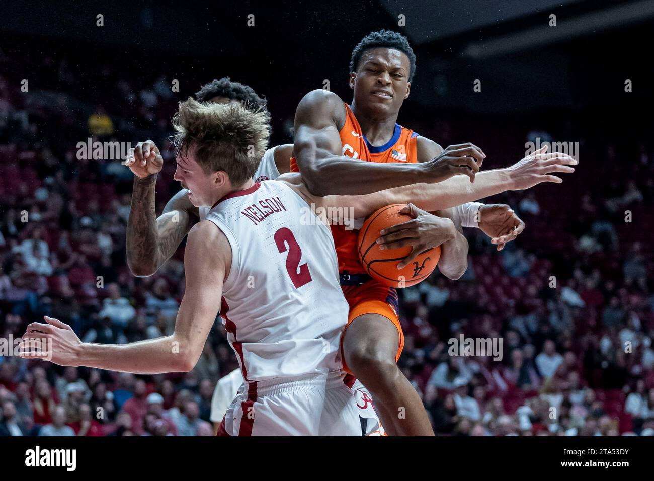 Clemson forward RJ Godfrey rebounds against Alabama forward Grant ...