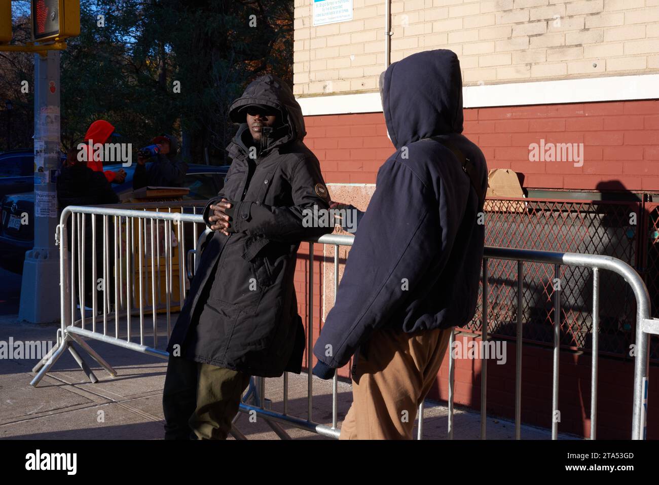 New York, New York, USA. 28th Nov, 2023. Migrants waiting outside in ...