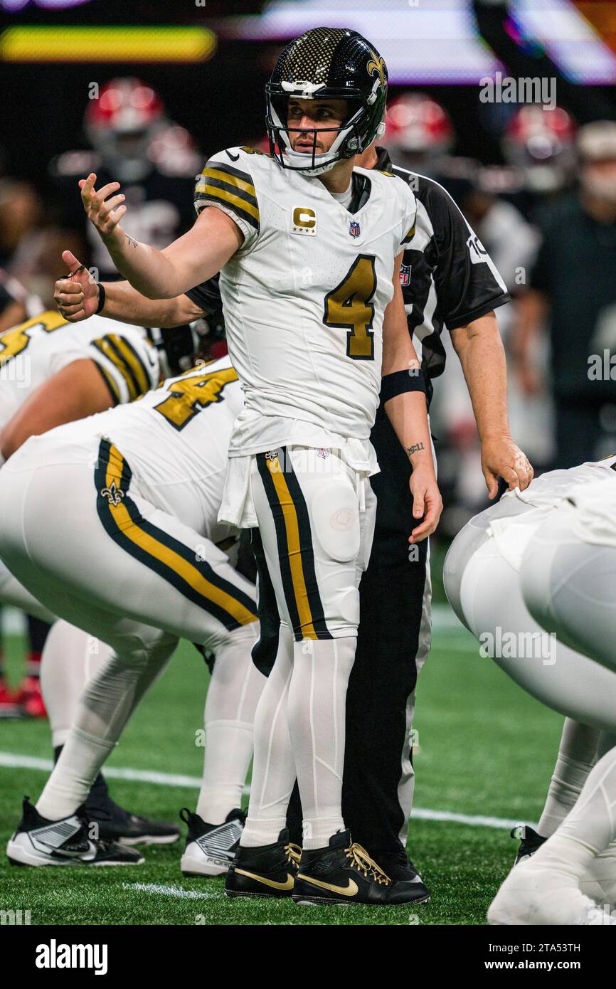 New Orleans Saints quarterback Derek Carr (4) works during the first ...