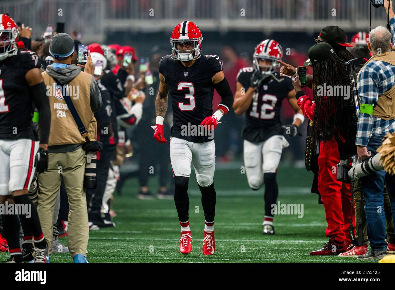 Atlanta Falcons safety Jessie Bates III (3) runs onto the field before ...