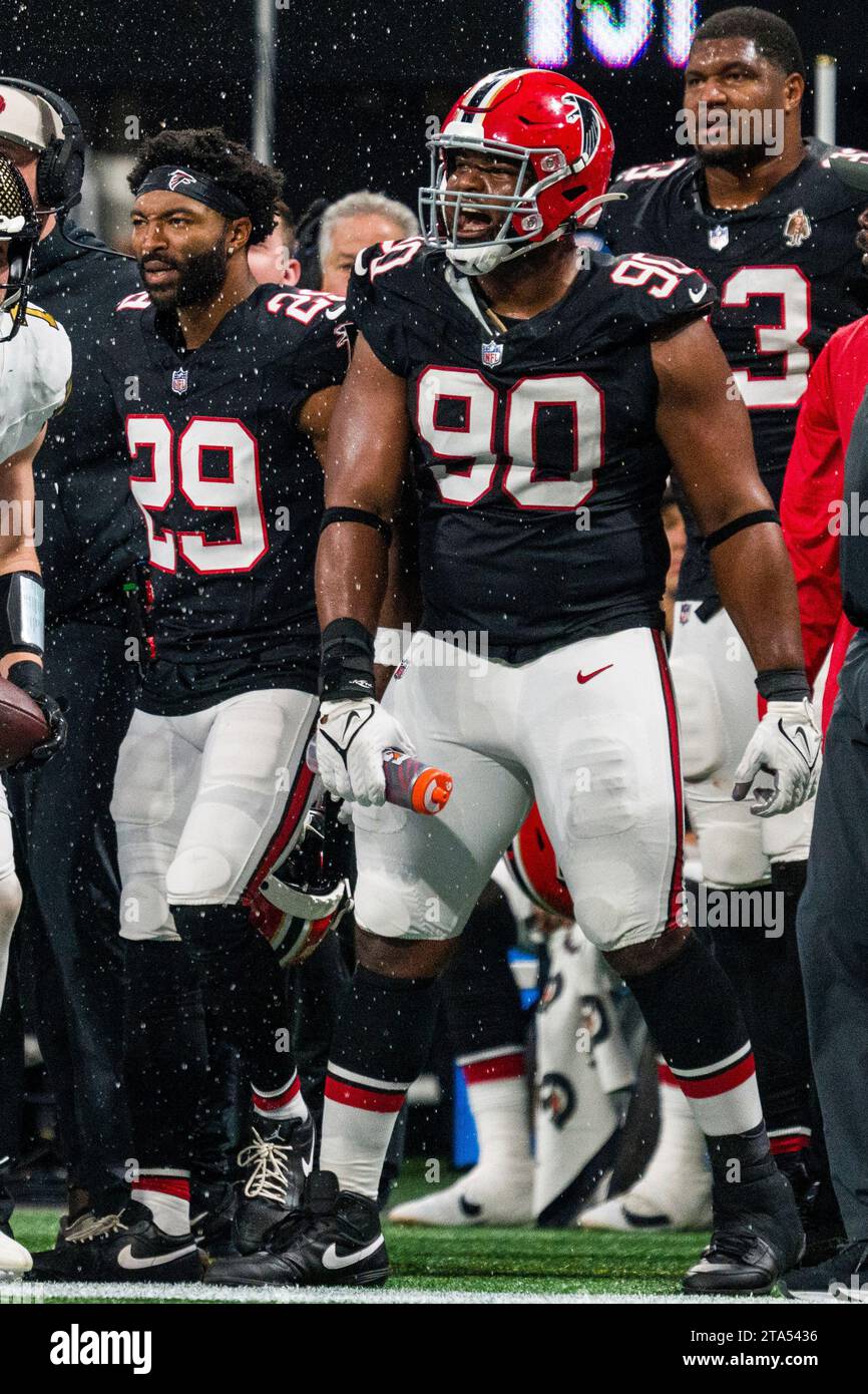 Atlanta Falcons defensive tackle David Onyemata (90) and safety Micah ...