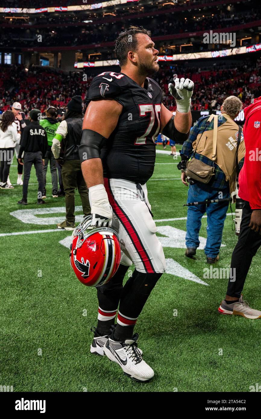 Atlanta Falcons offensive tackle Jake Matthews (70) walks off the field ...