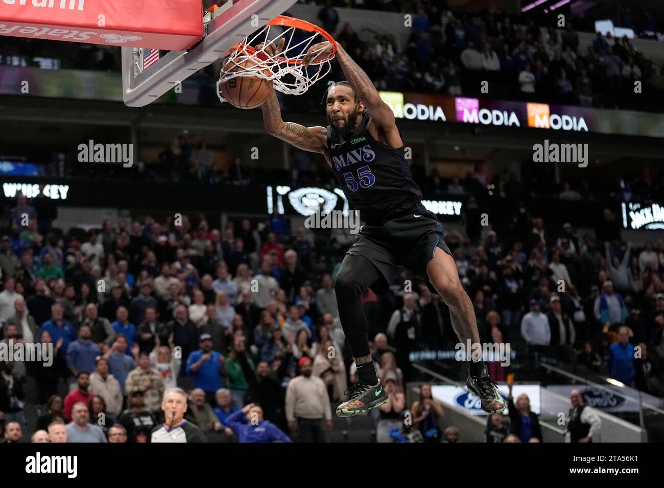 Dallas Mavericks forward Derrick Jones Jr. (55) dunks the ball in the ...
