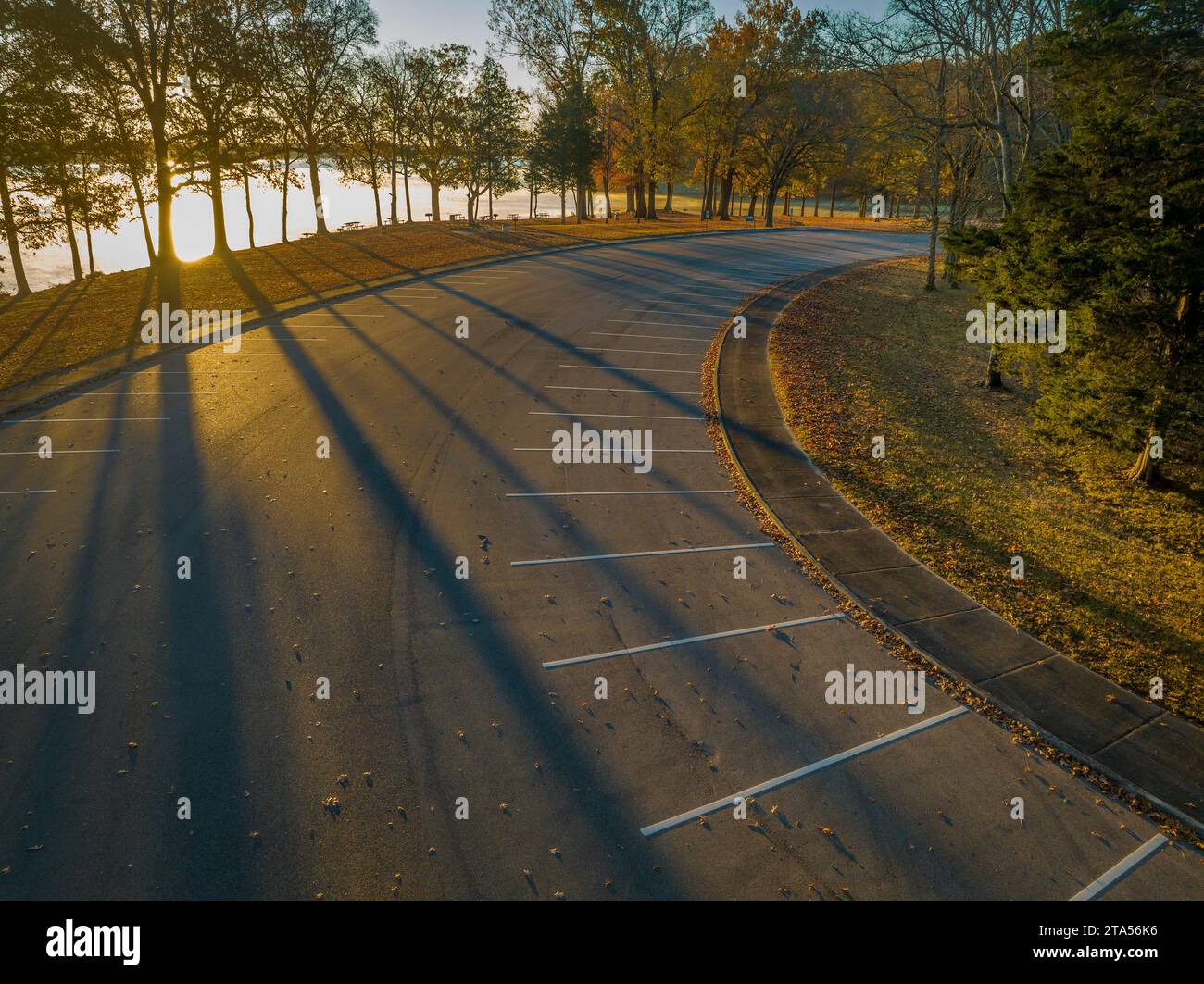 sunrise over the Tennessee RIver and parking lot in Colbert Ferry Park ...