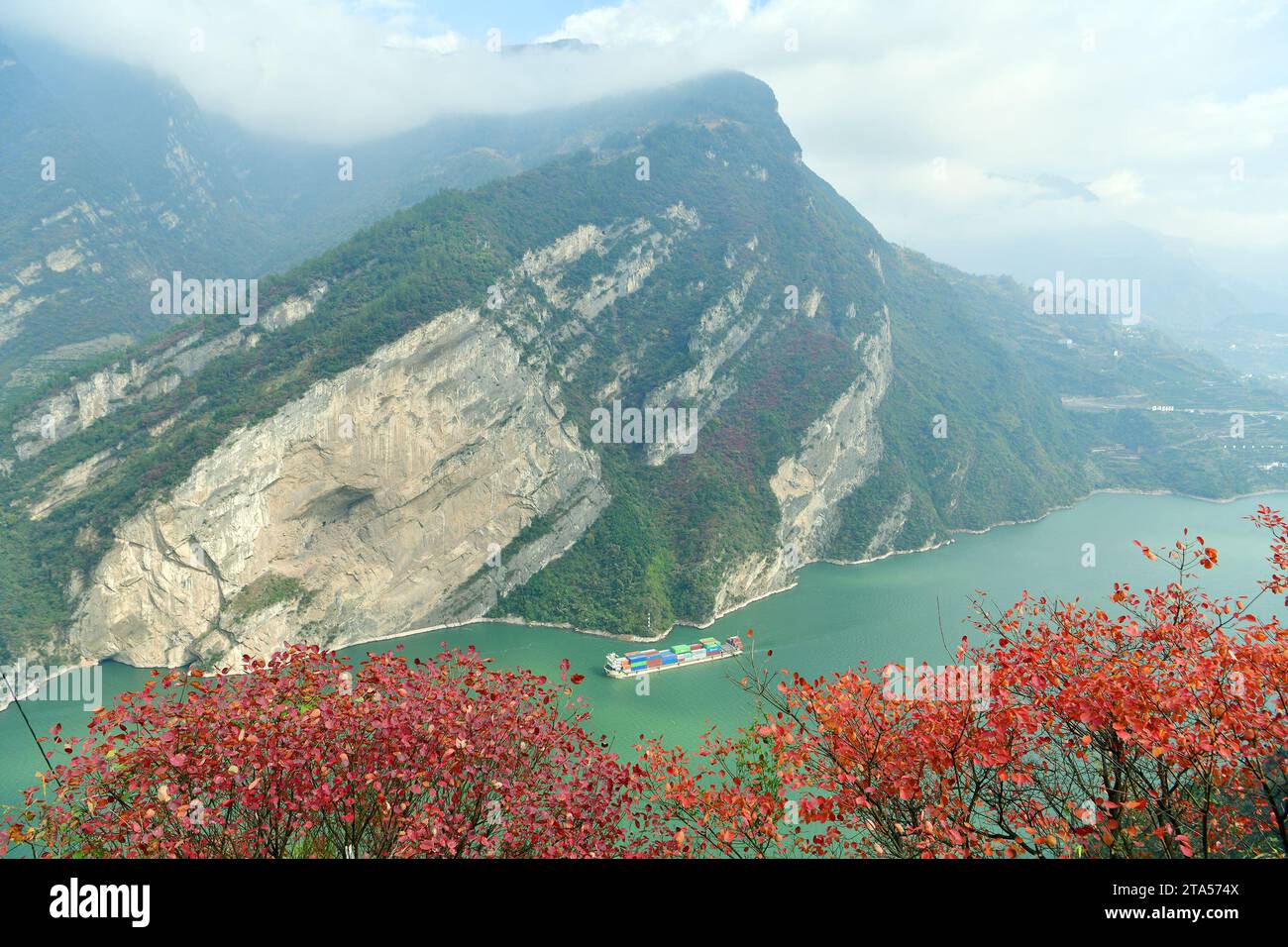 YICHANG, CHINA - NOVEMBER 27, 2023 - Cargo ships travel along the ...