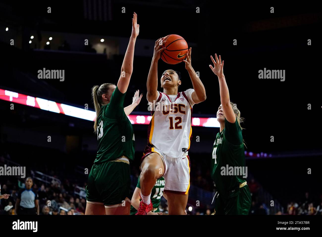 Southern California guard JuJu Watkins, center, shoots past Cal Poly ...
