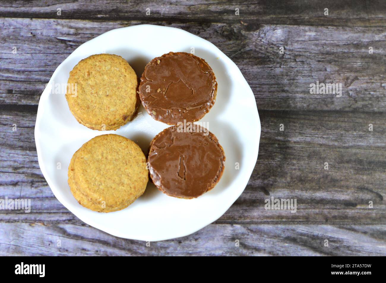 chocolate coated oat biscuits, sweet treat during the day as a snack ...