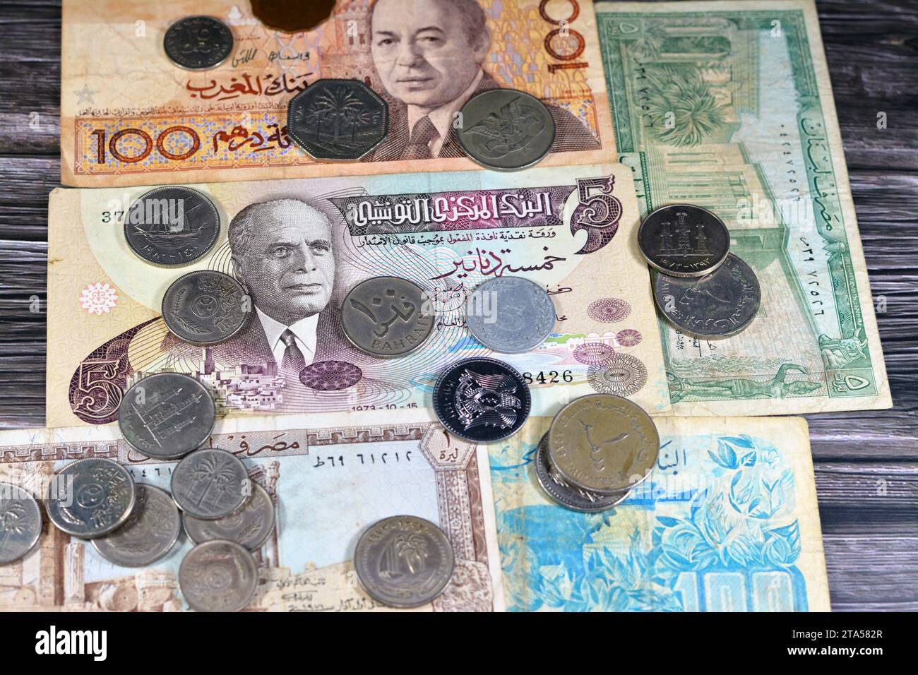 Collection of Old Arabian money banknotes and coins from different ...