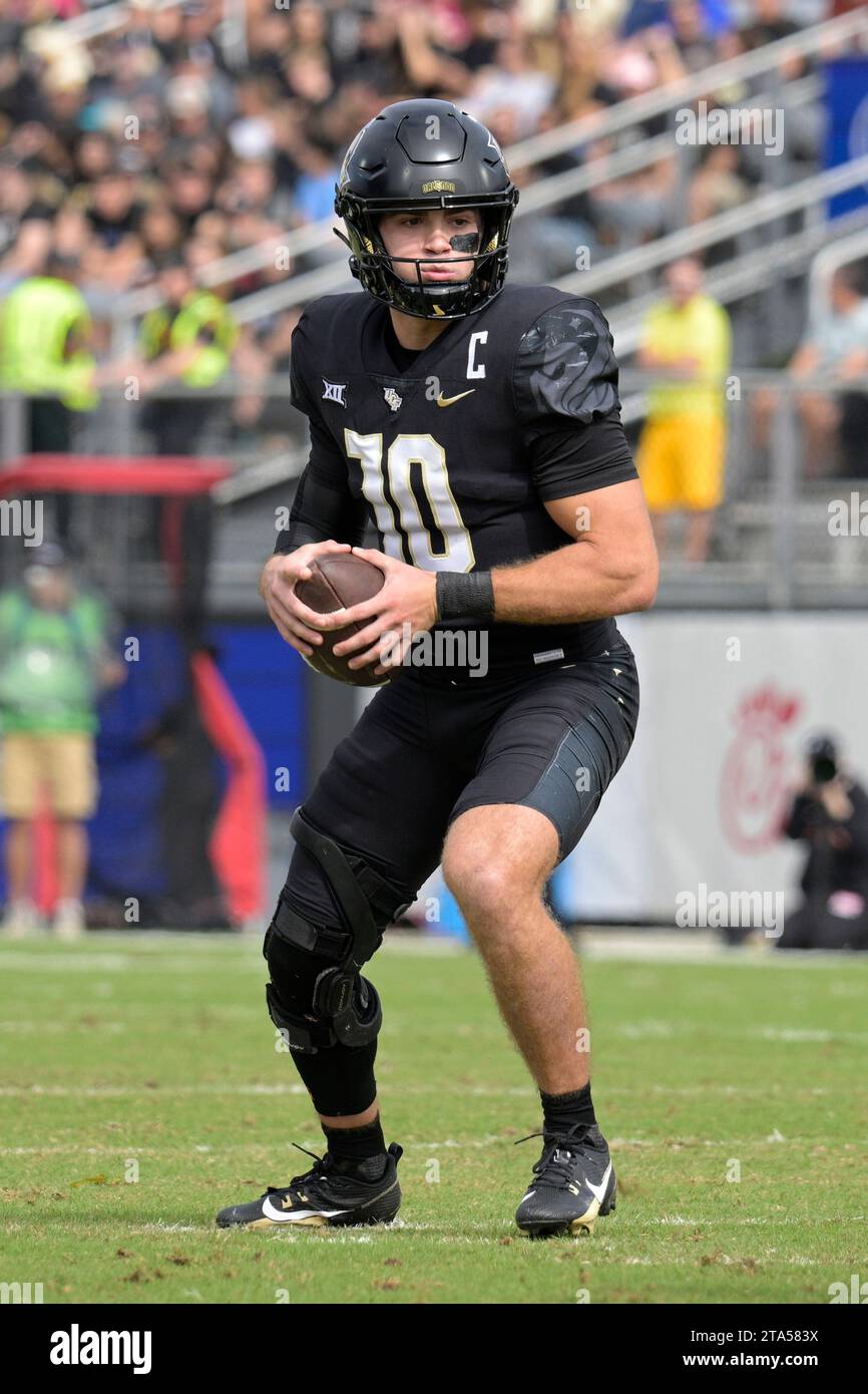 Central Florida quarterback John Rhys Plumlee (10) scrambles for ...