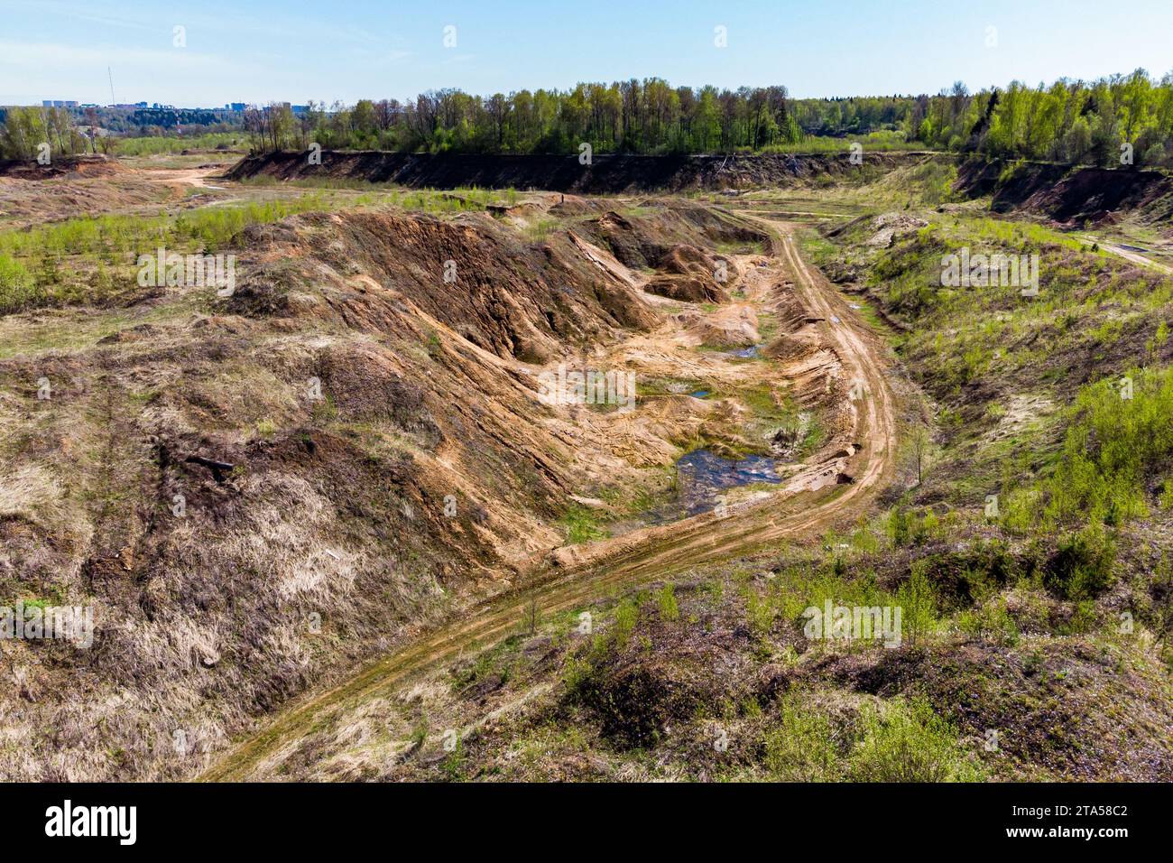 Sand mounds on an old overgrown sand quarry Stock Photo - Alamy