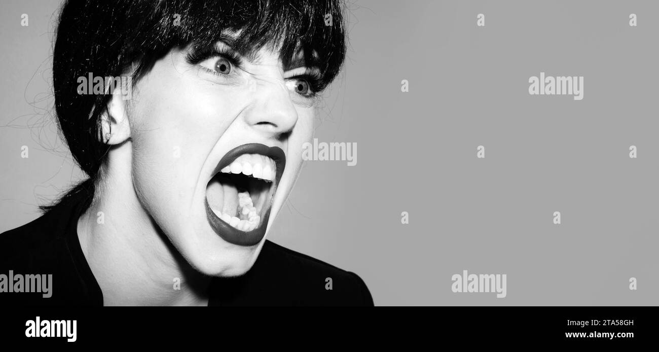 Woman shouting and screaming loud with open mouth. Human emotions ...