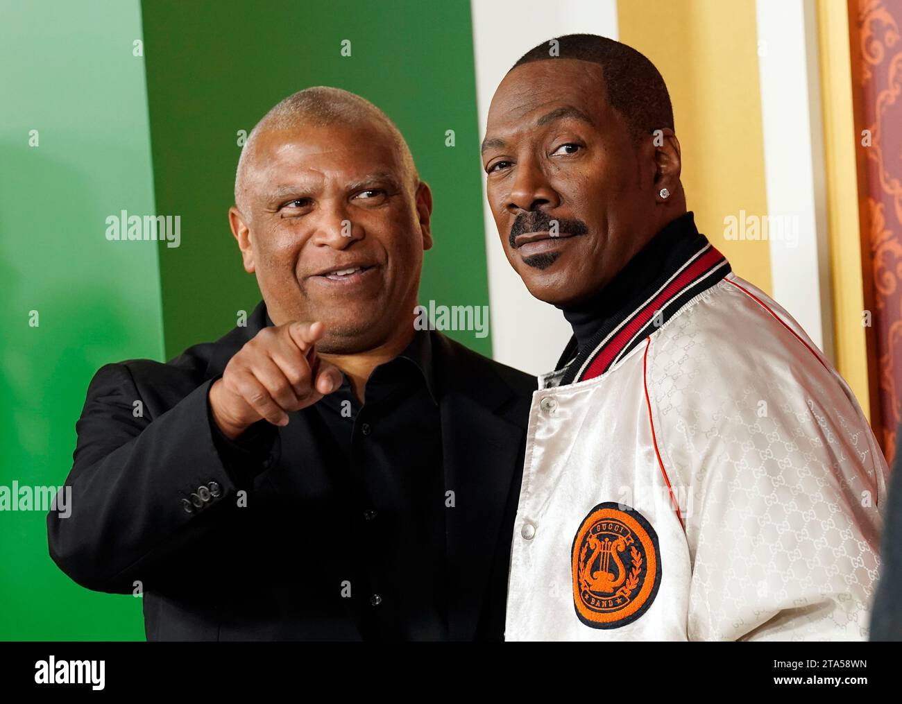 Reginald Hudlin, left, director of "Candy Cane Lane," poses with the ...