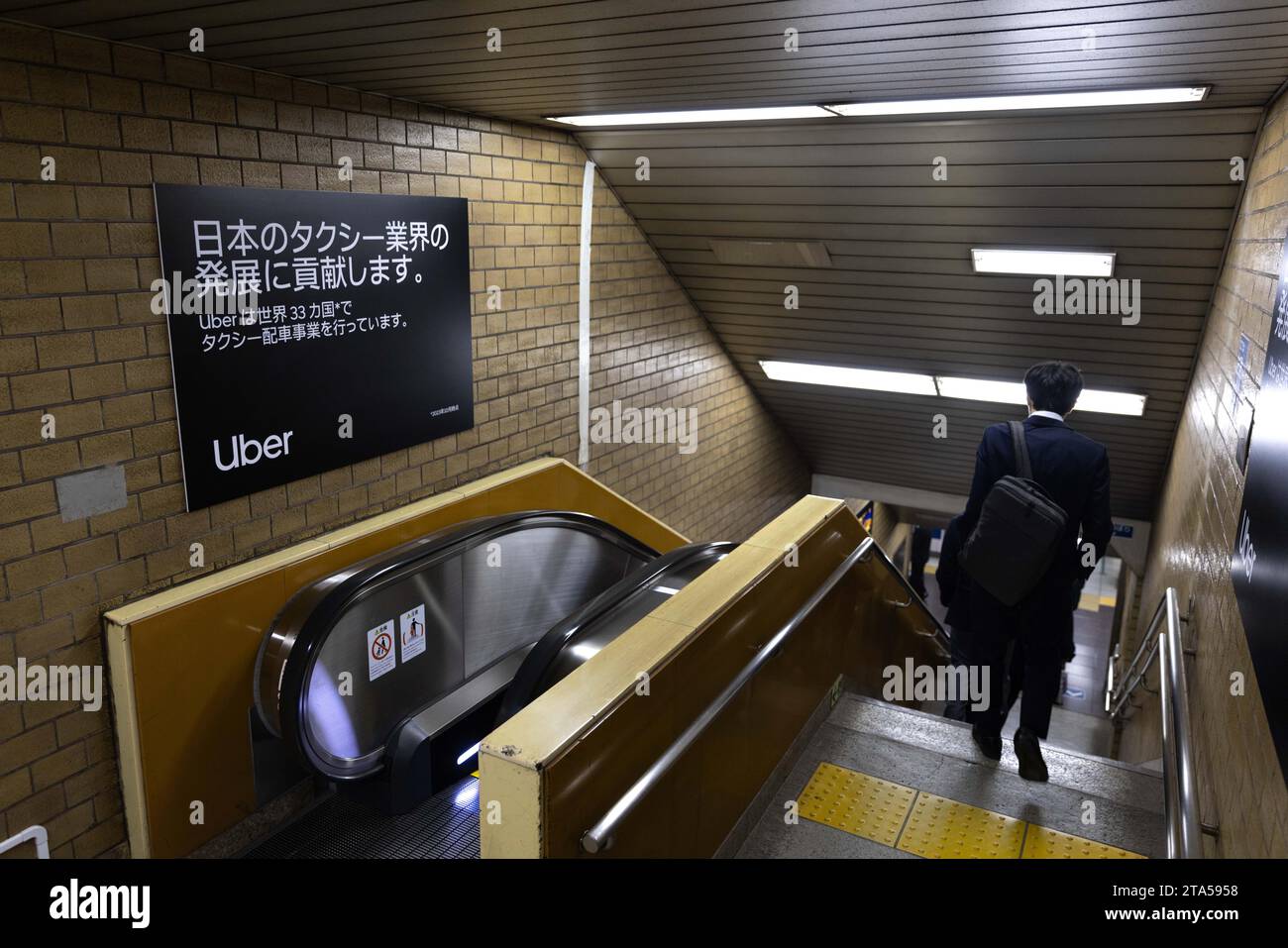 Tokyo, Japan. 28th Nov, 2023. Uber advertisement on the subway in Tokyo ...