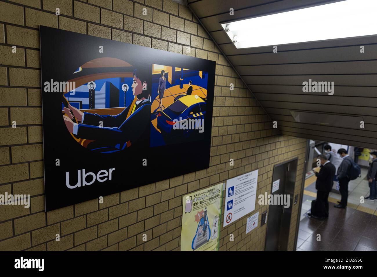 Tokyo, Japan. 28th Nov, 2023. Uber advertisement on the subway in Tokyo ...