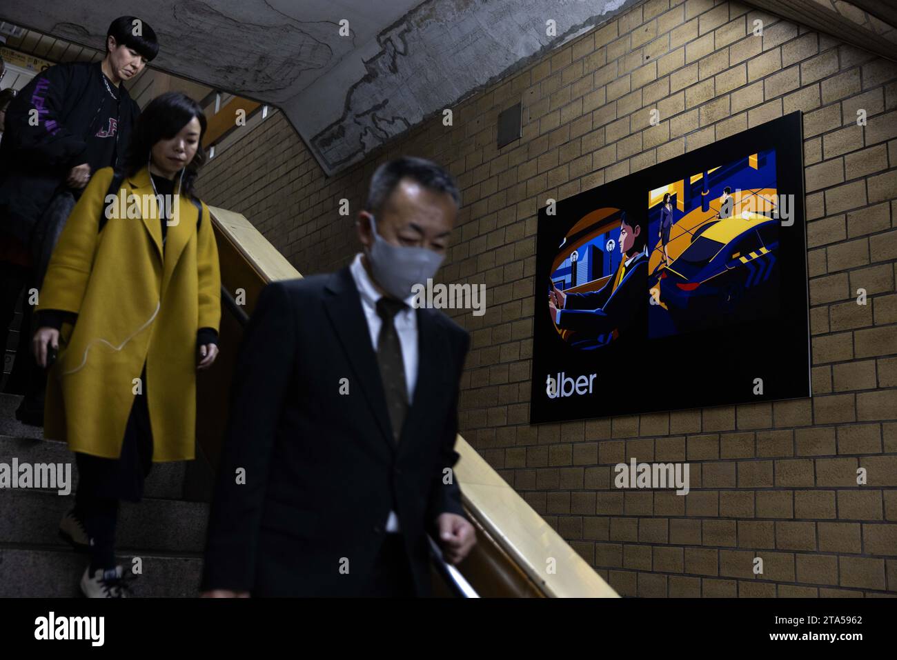 Tokyo, Japan. 28th Nov, 2023. Uber advertisement on the subway in Tokyo ...