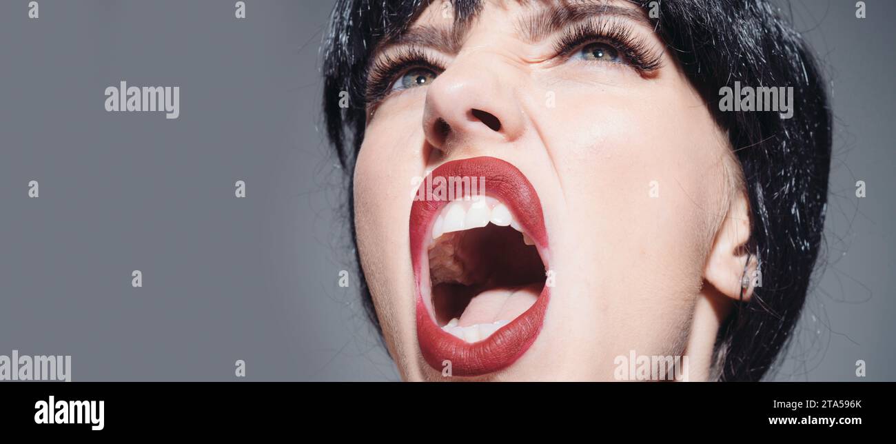Crazy woman screaming and shouting. Shout and scream mouth. Close up ...
