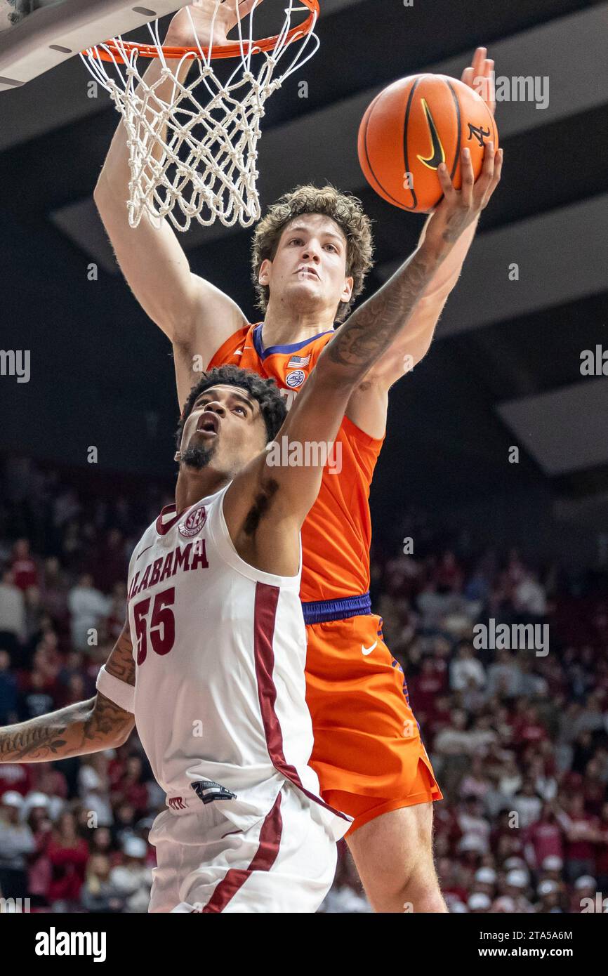 Clemson center PJ Hall (24) defends as Alabama guard Aaron Estrada (55 ...
