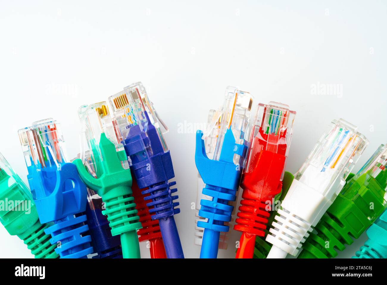 Colorful network cables switch on white background Stock Photo - Alamy