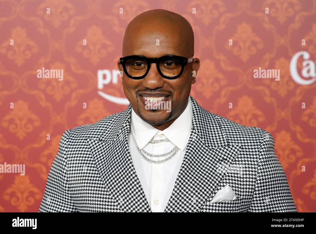 Chris Redd poses at the premiere of the film "Candy Cane Lane" at the ...