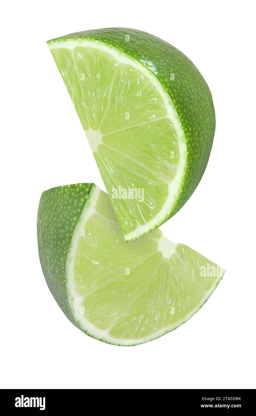 hanging, falling and flying piece of lime fruits isolated on white ...
