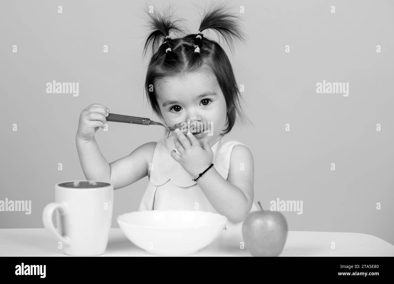 Cute baby child eat food, babies eating. Kid girl eating healthy food ...