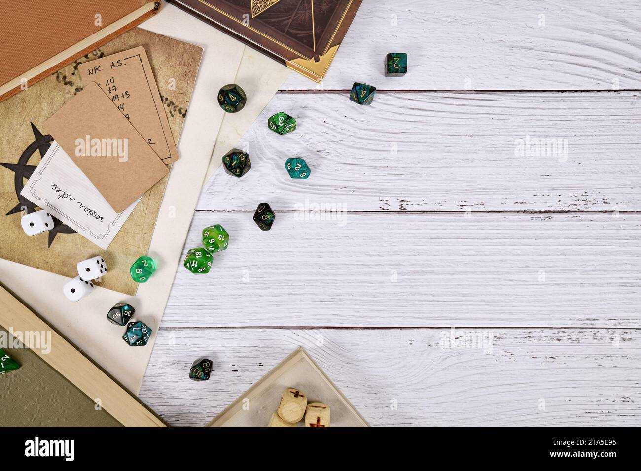 Tabletop role playing flat lay background with RPG dices, rule books ...