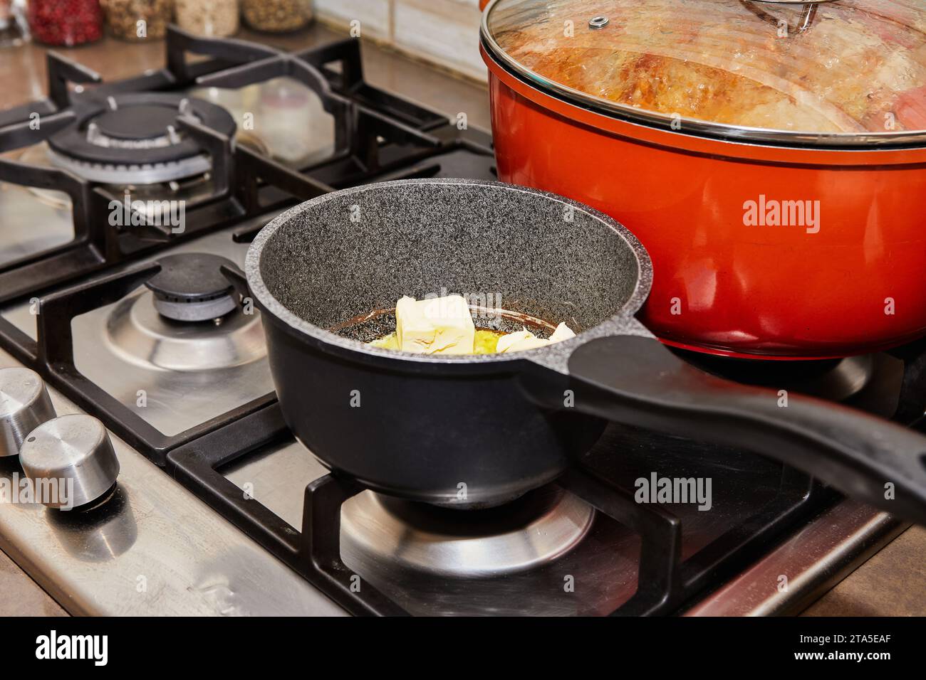 Making hot cocoa stove hi-res stock photography and images - Alamy