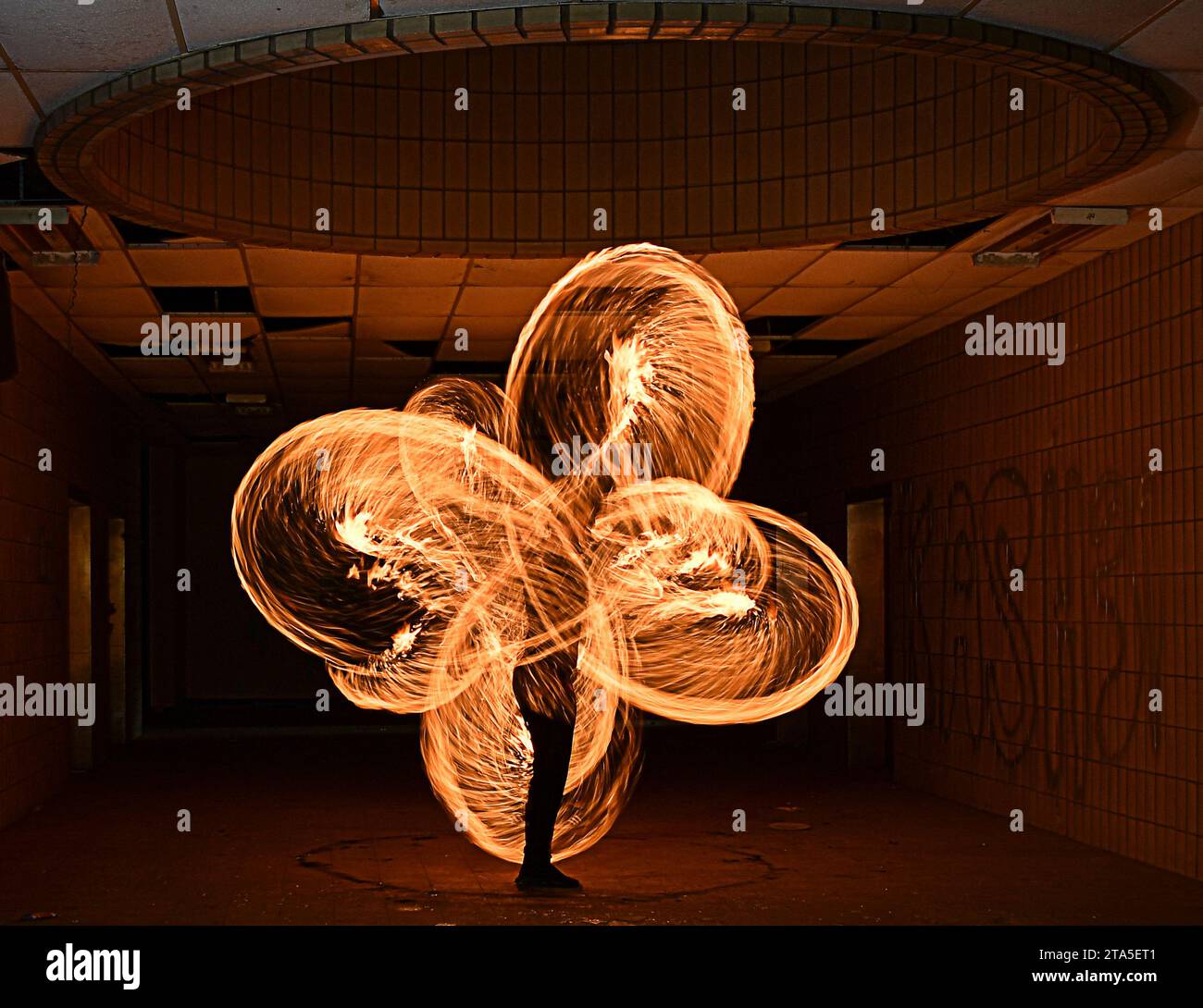 Slow shutter Fire dancer Stock Photo - Alamy
