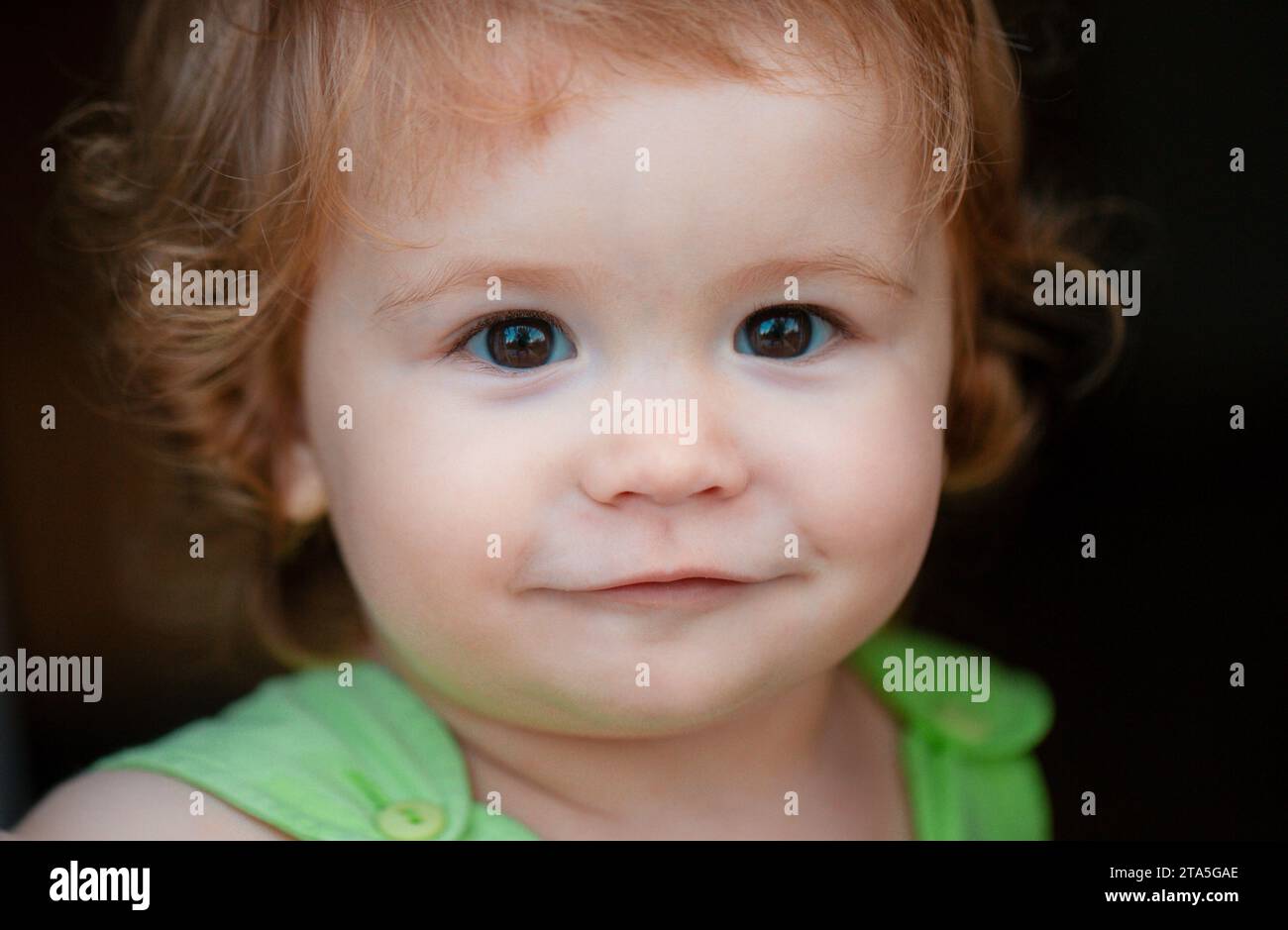 Funny baby face close up. Kids head portrait Stock Photo - Alamy