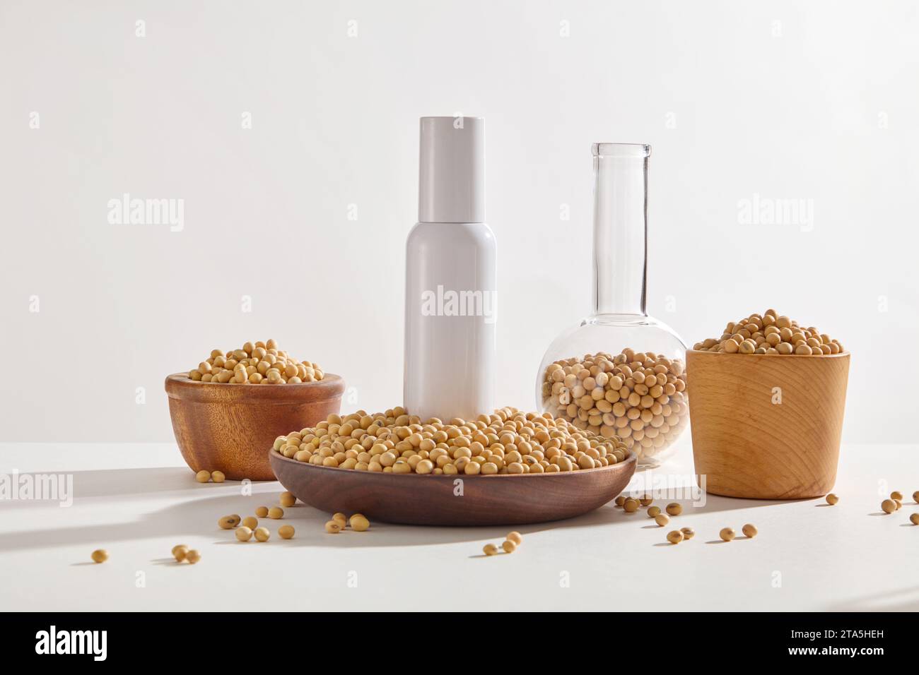 Some wooden containers of soybeans decorated with a bottle without ...