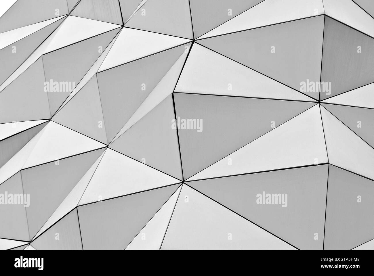 Modern office building with white metallic panel facade and windows ...