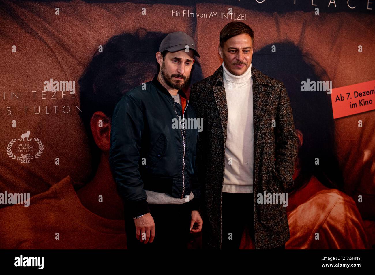 Berlin, Germany. 28th Nov, 2023. Tom Wlaschiha (r), actor, and Clemens ...