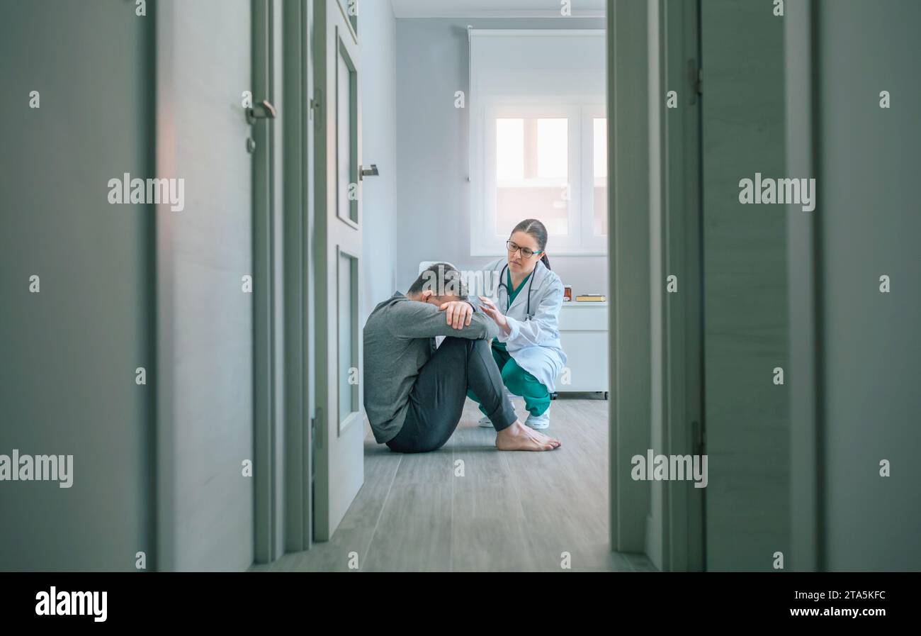 Psychiatrist talking to patient with mental disorder and suicidal ...