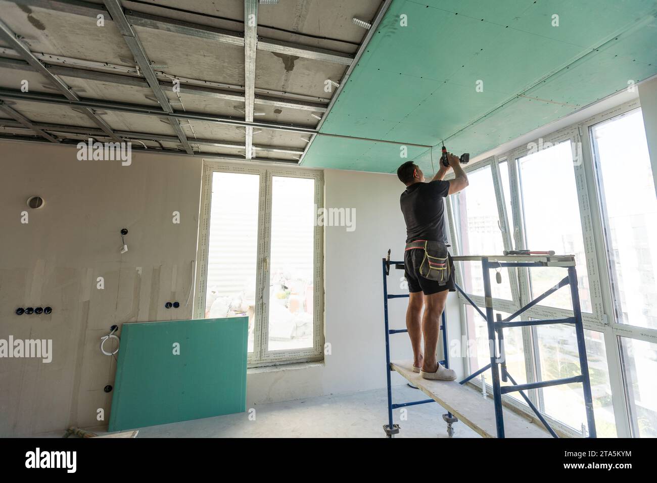 The construction workers doing the installation work for new ...