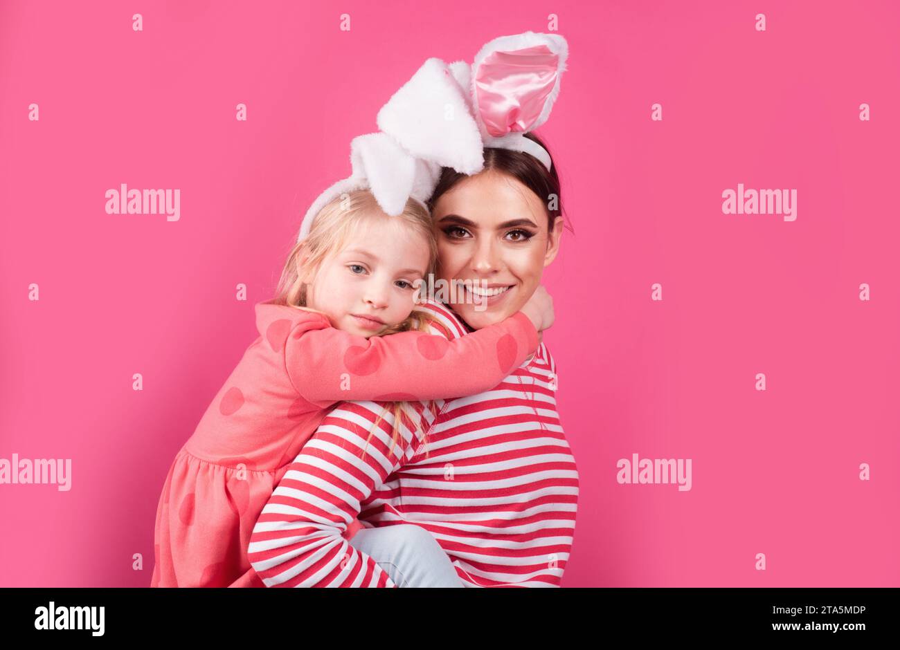 Happy Easter. Girls with bunny ears. Egg hunt. Traditional spring holiday Stock Photo - Alamy