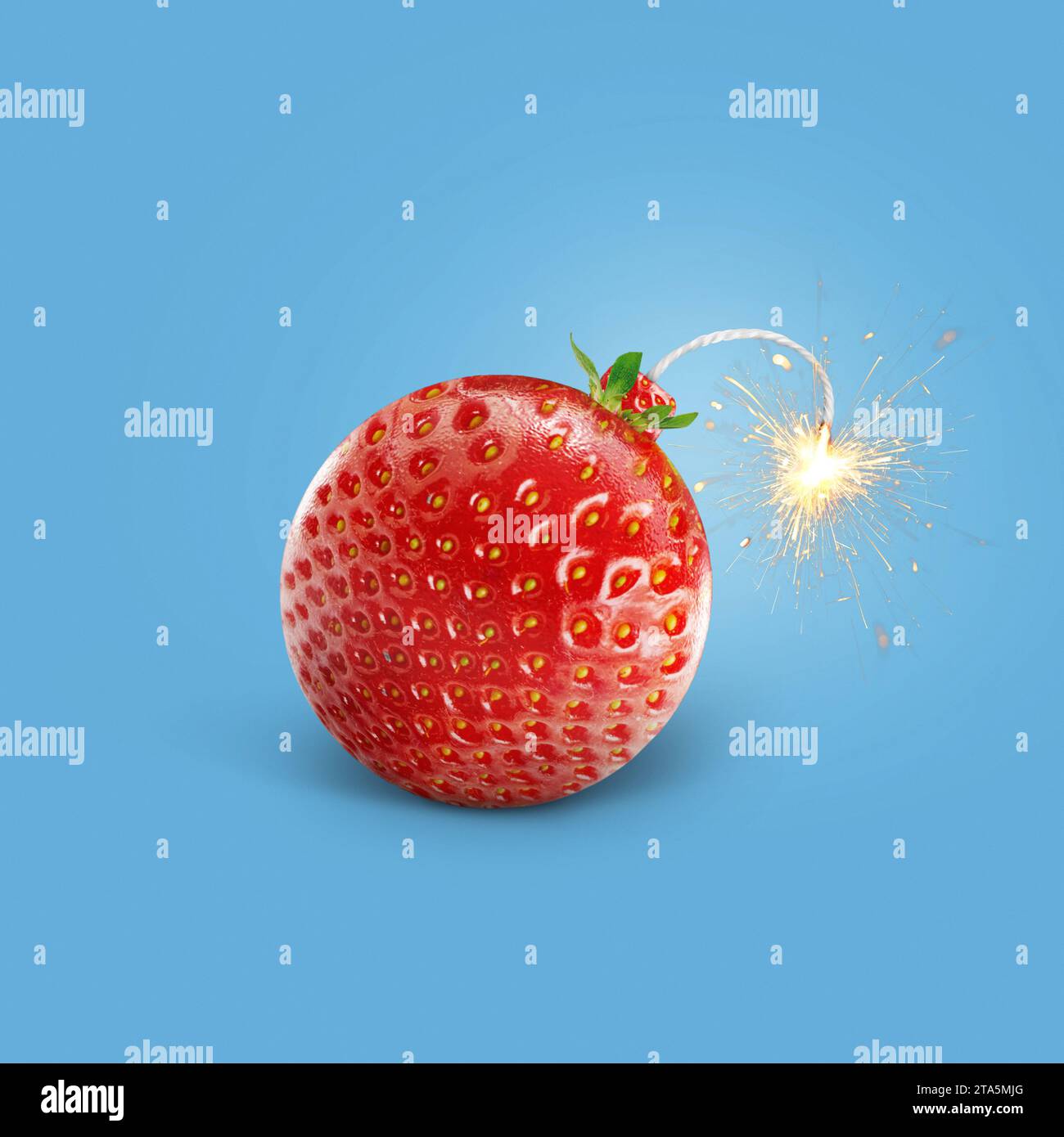 Creative strawberry bomb with wick and sparks burning on a blue ...